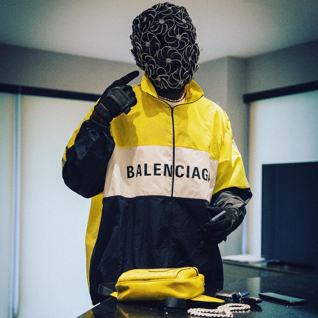 Masked rapper DIDE claims to be a professional footballer